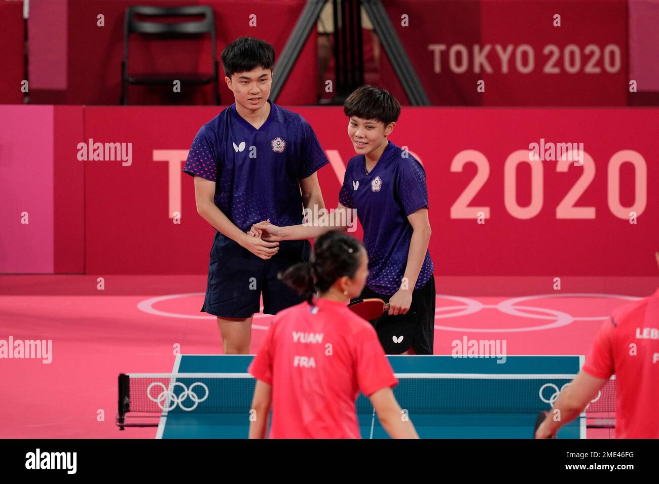 Taiwan's Lin Yun-Ju, left, and Cheng I-ching celebrate after winning ...