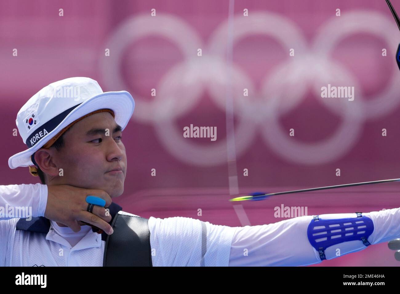 South Korea's Kim Je Deok shoots an arrow during the men's team ...