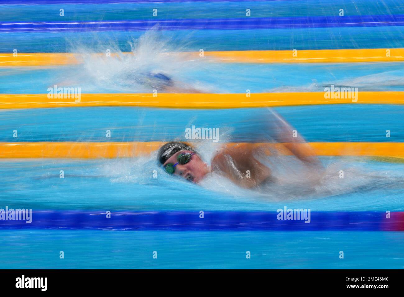 Eve Thomas, of New Zealand, swims in a heat during the women's 1500 ...