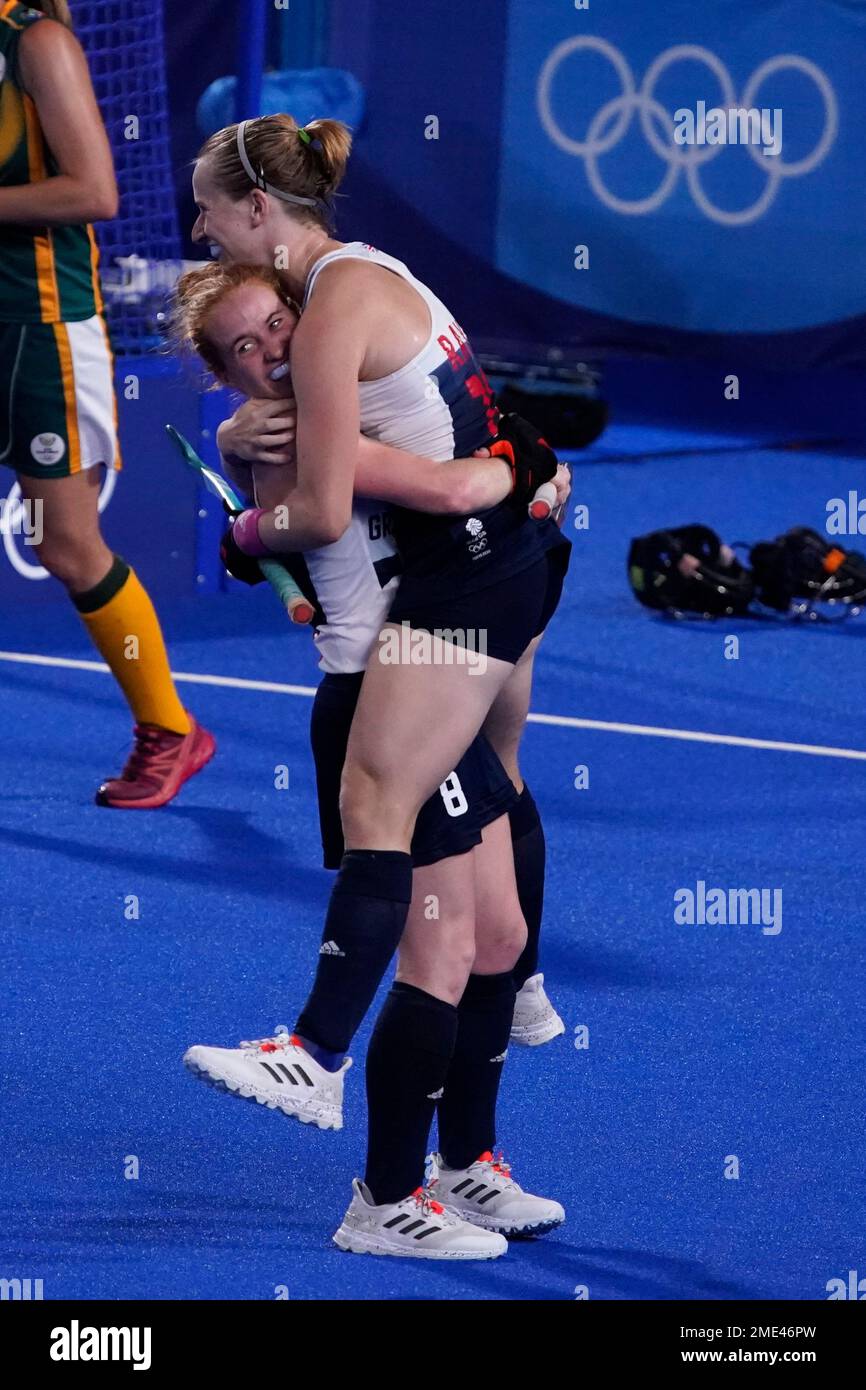 Great Britain's Sarah Louise Jones (8) embraces Elena Sian Rayer after ...