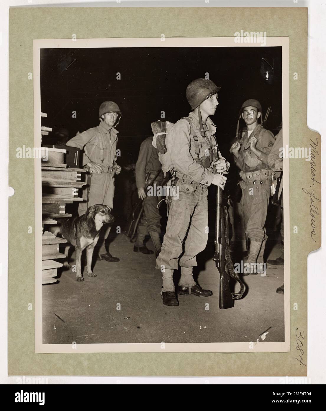 Pete, the mascot dog, accompanies the U.S. Coast Guard crew as they ...