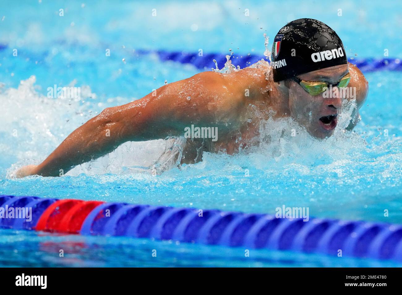 Giacomo Carini, of Italy, swims in a heat during the men's 200-meter ...