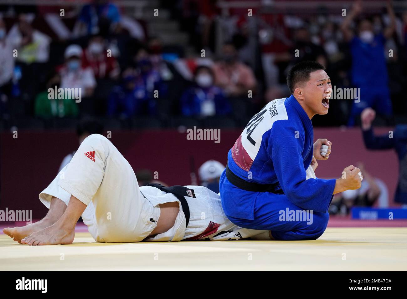 Tsogtbaatar Tsend-Ochir of Mongolia celebrates after defeating Arthur ...