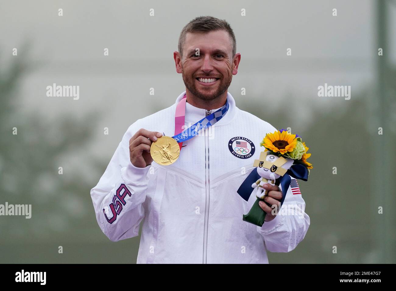 Gold medalist Vincent Hancock, of the United States, celebrates after ...