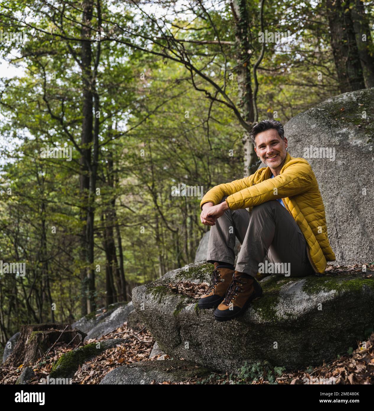 Portrait man sitting forest hi-res stock photography and images - Alamy