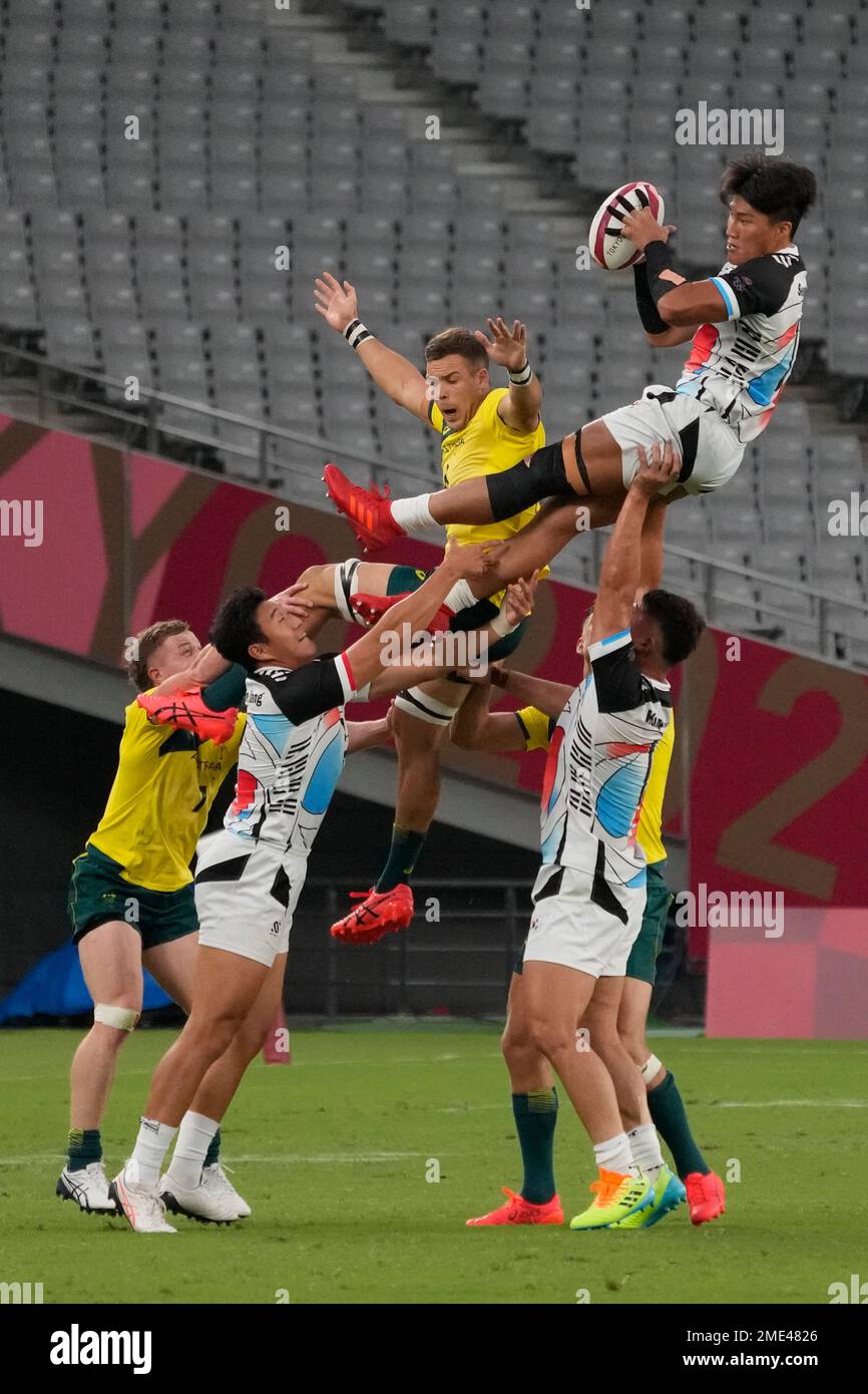 South Korea's Choi Seong-deok snags the lineout against Australia's Joe ...