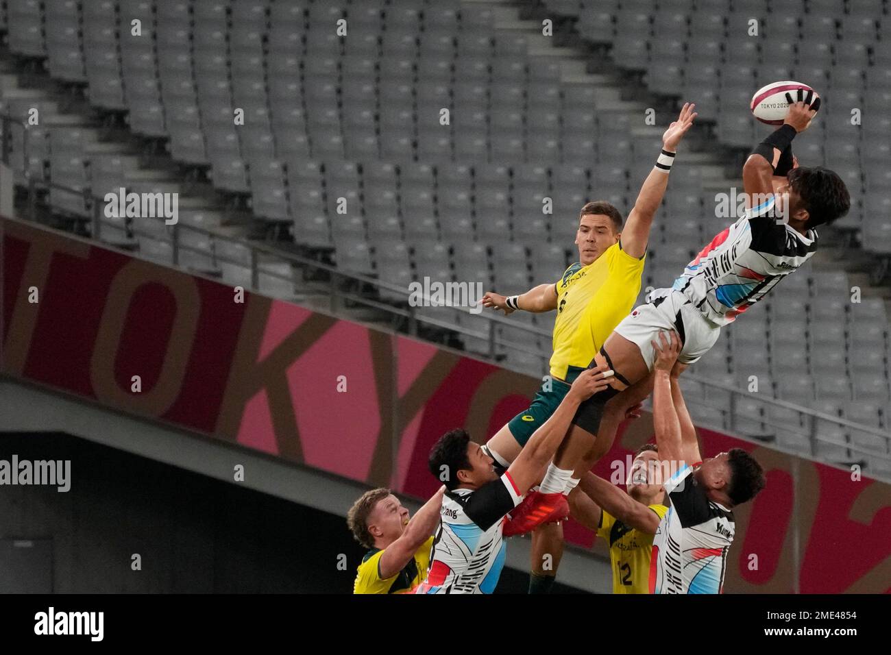 South Korea's Choi Seong-deok snags the lineout against Australia's Joe ...