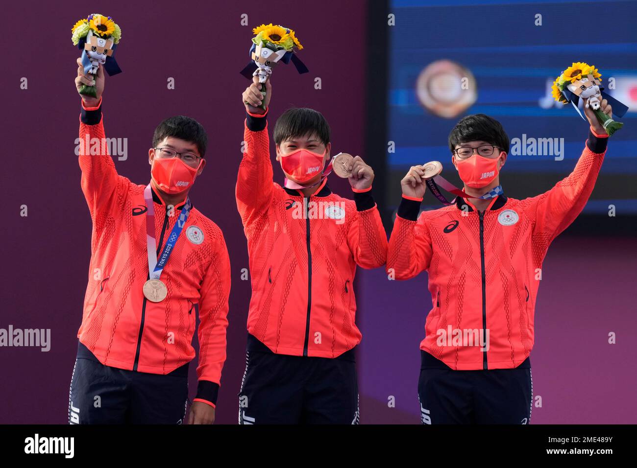 From left, bronze medal winners Japan's Takaharu Furukawa, Yuki Kawata, Hiroki Muto celebrate ...