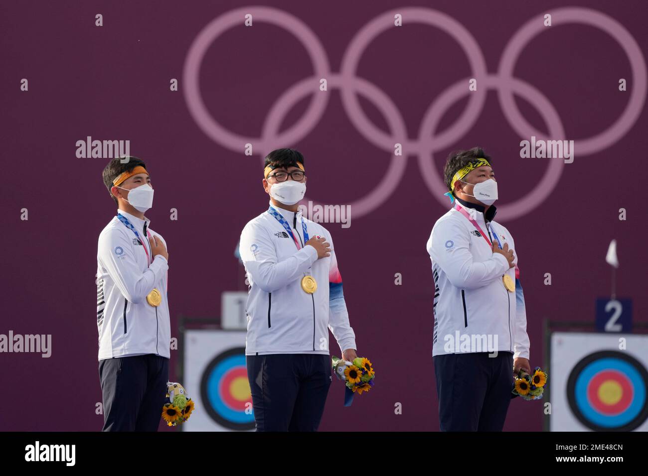 From left, gold medal winners South Korea's Kim Je Deok, Kim Woojin ...