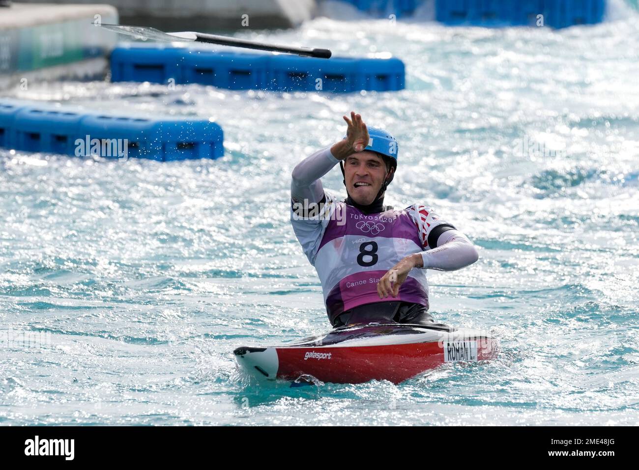 Lukas Rohan of the Czech Republic celebrates by throwing his paddle as ...