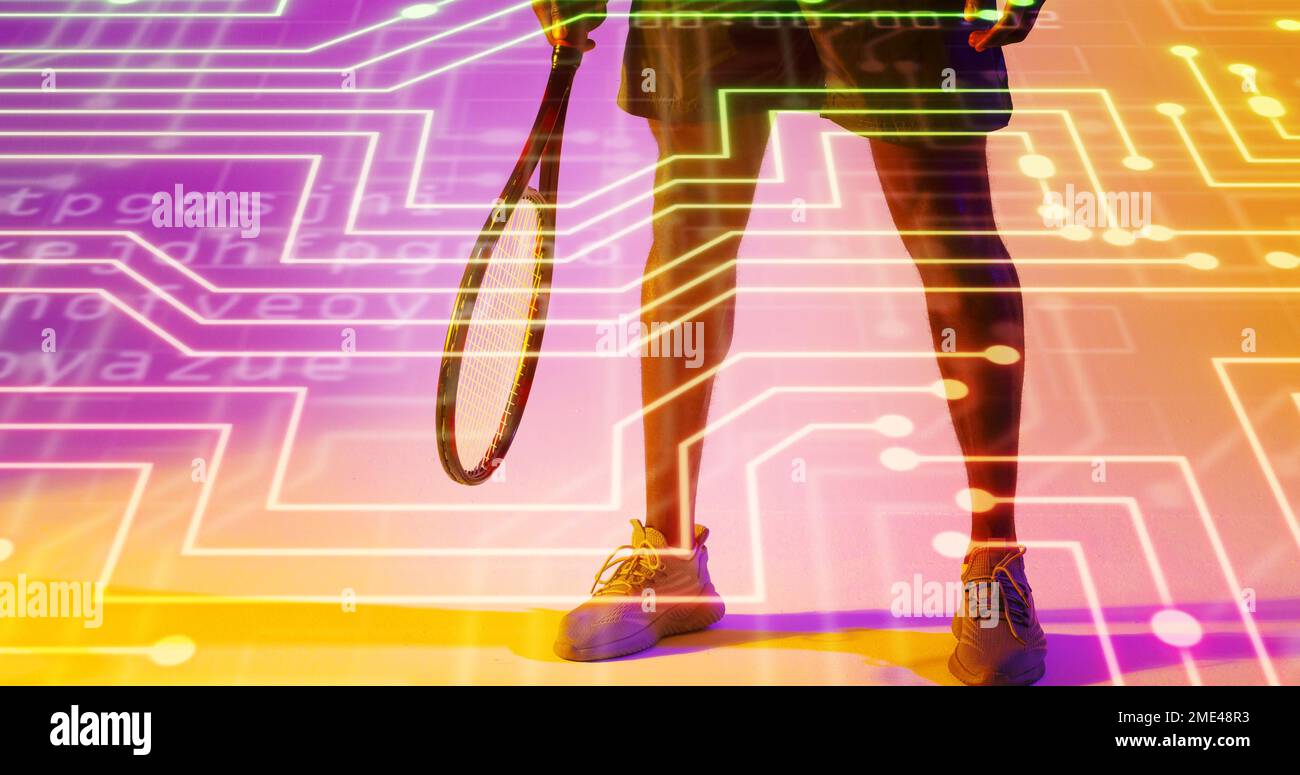 Low section of african american male tennis player with racket over ...