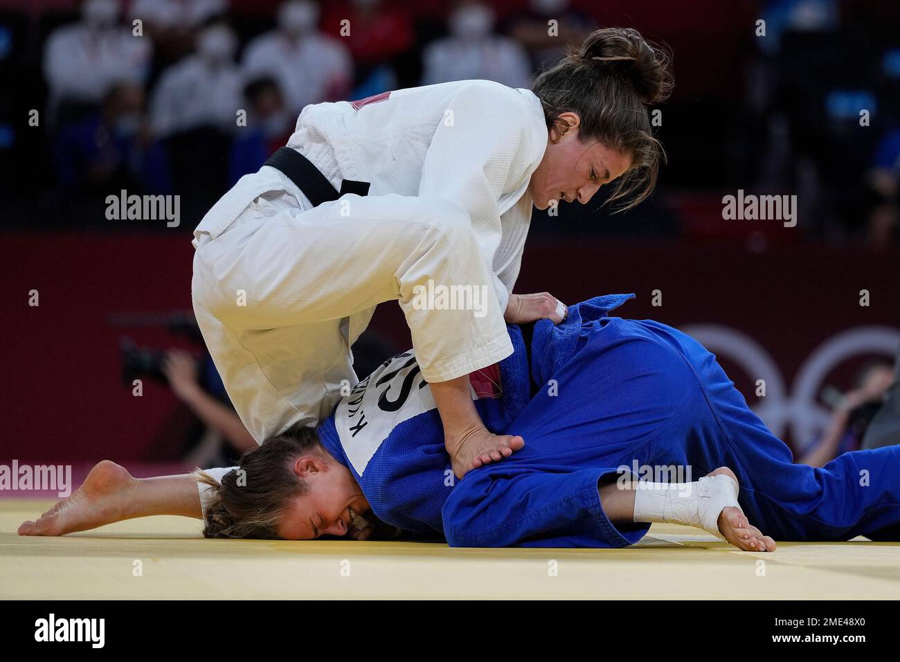 Timna Nelson Levy of Israel, top, and Kaja Kajzer of Slovenia compete ...