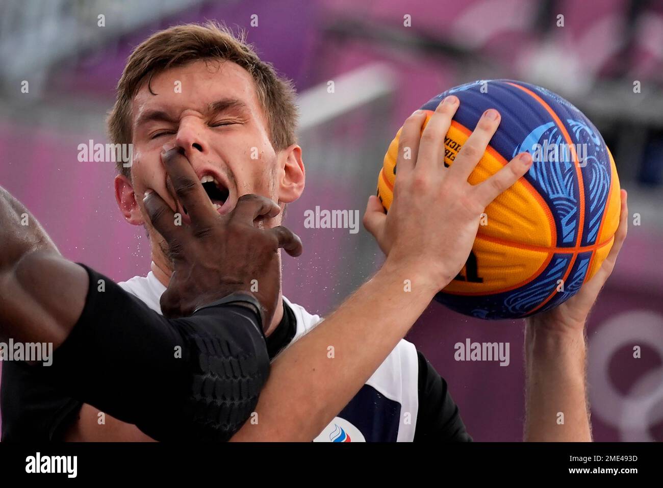 Alexander Zuev, of the Russian Olympic Committee, is fouled by Ira ...