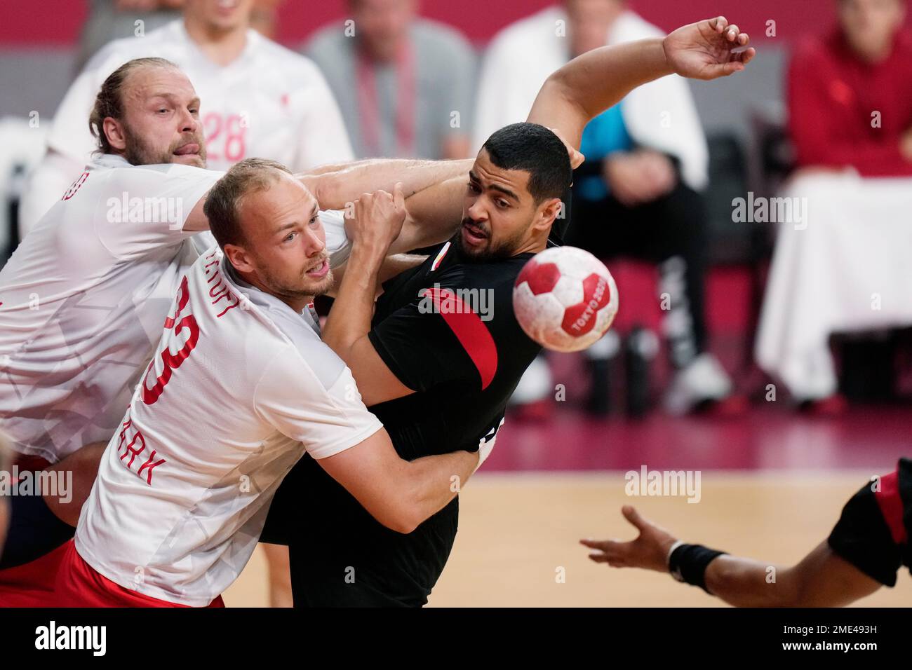 Egypt's Ahmed Mohamed, center right, and Denmark's Henrik Toft Hansen ...
