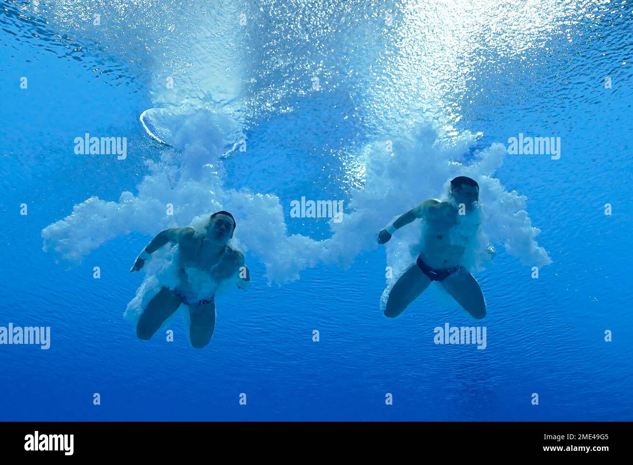 Silver medal winners China's Cao Yuan and Chen Aisen compete in the ...