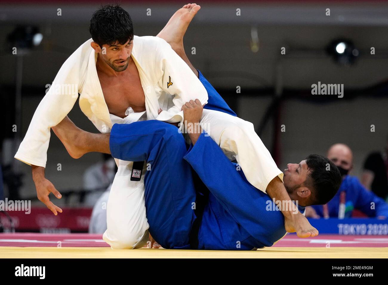 Lasha Shavdatuashvili of Georgia, top, and Aden-Alexandre Houssein of ...