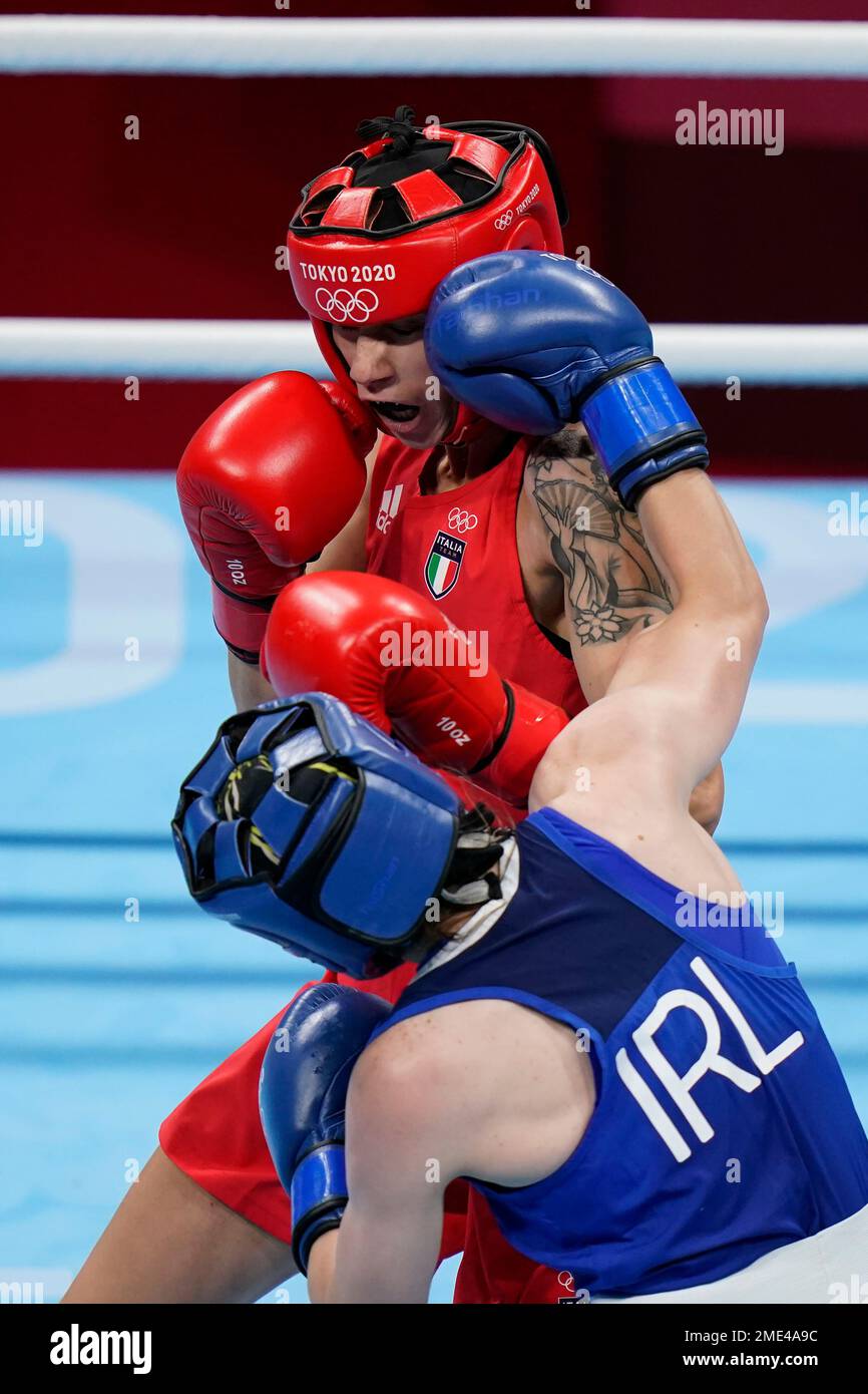 Ireland's Michaela Walsh, bottom, lands a blow to Italy's Irma Testa ...