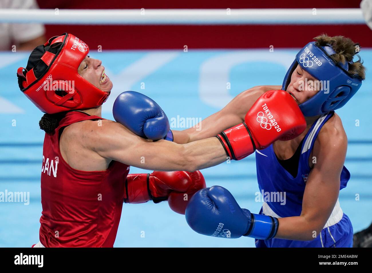 Caroline Veyre, of Canada, left, and Croatia's Nikolina Acic exchange ...