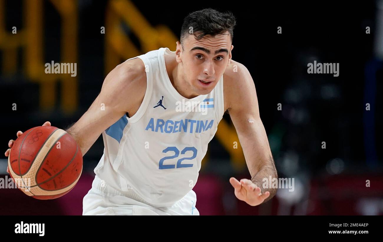 Argentina's Juan Pablo Vaulet (22) drives to the basket during men's ...