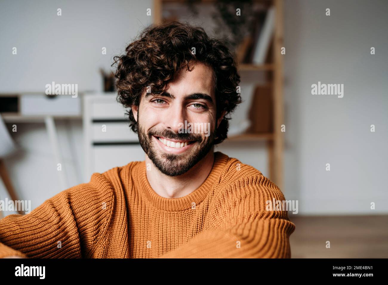 Young happy man home hi-res stock photography and images - Alamy