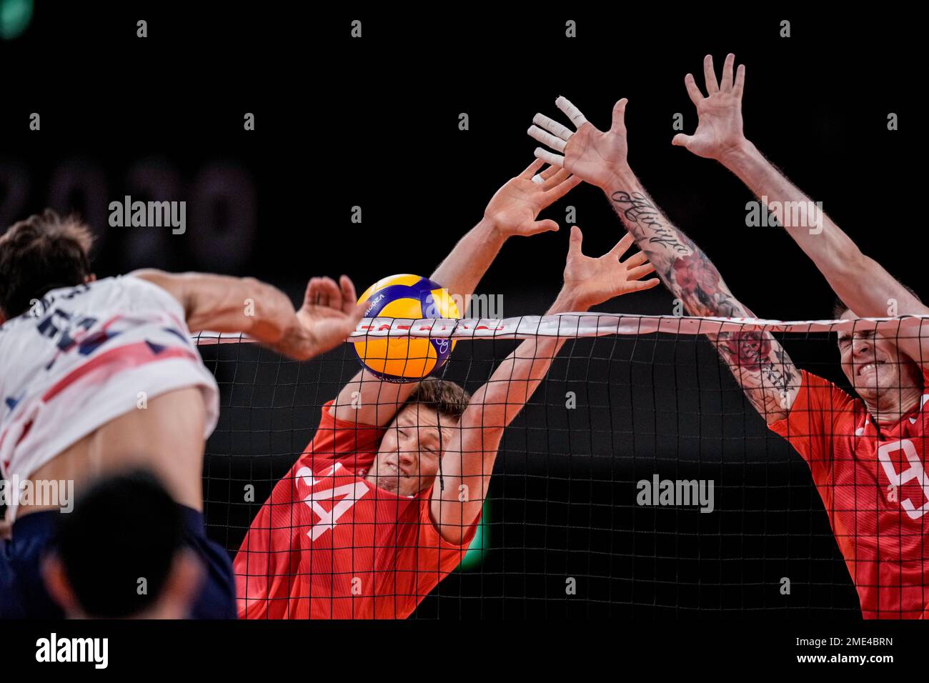 Igor Kobzar, of the Russian Olympic Committee, and Ivan Iakovlev, of ...