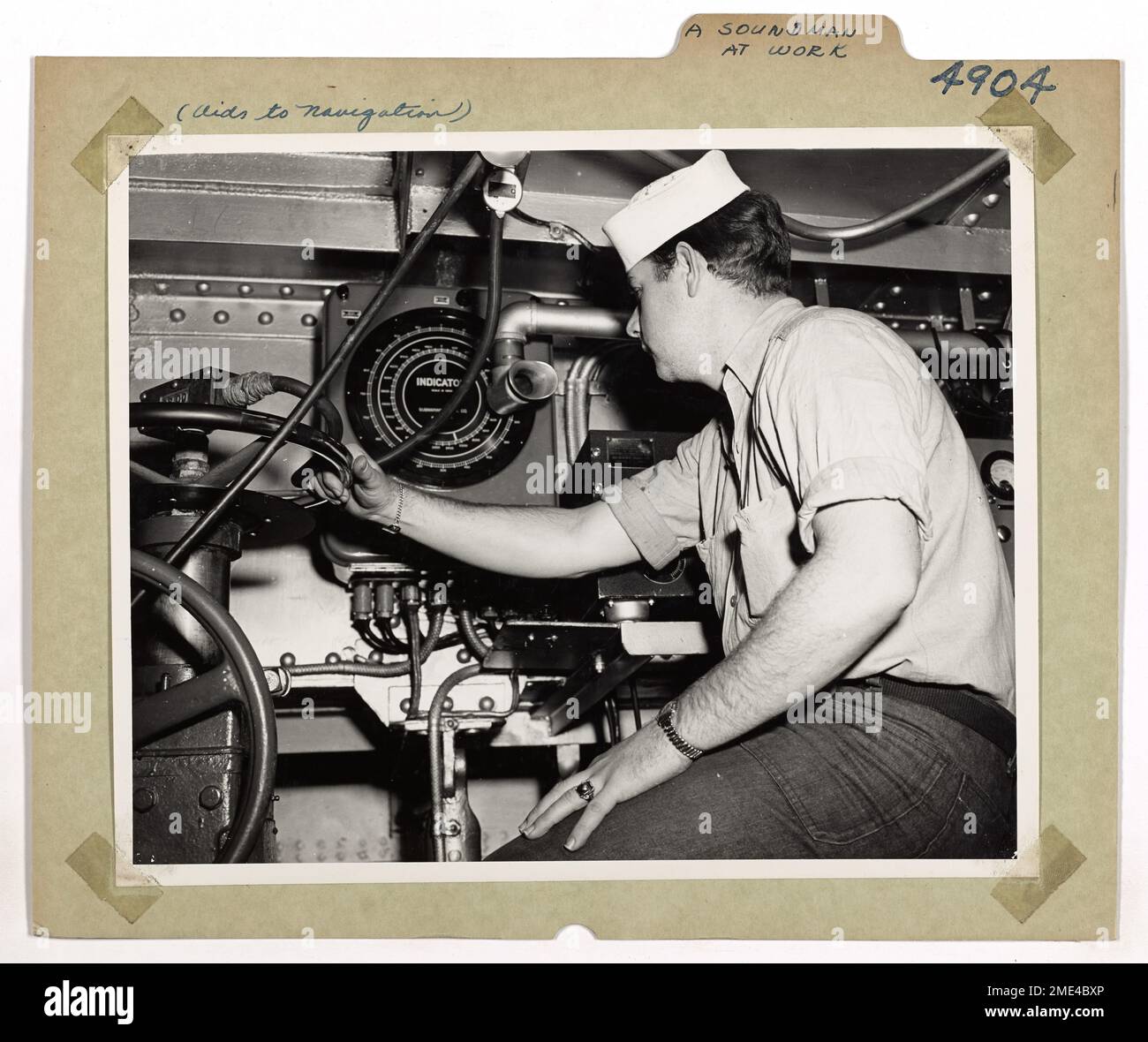 A Coast Guard soundman operates an echo-ranging device aboard the ...