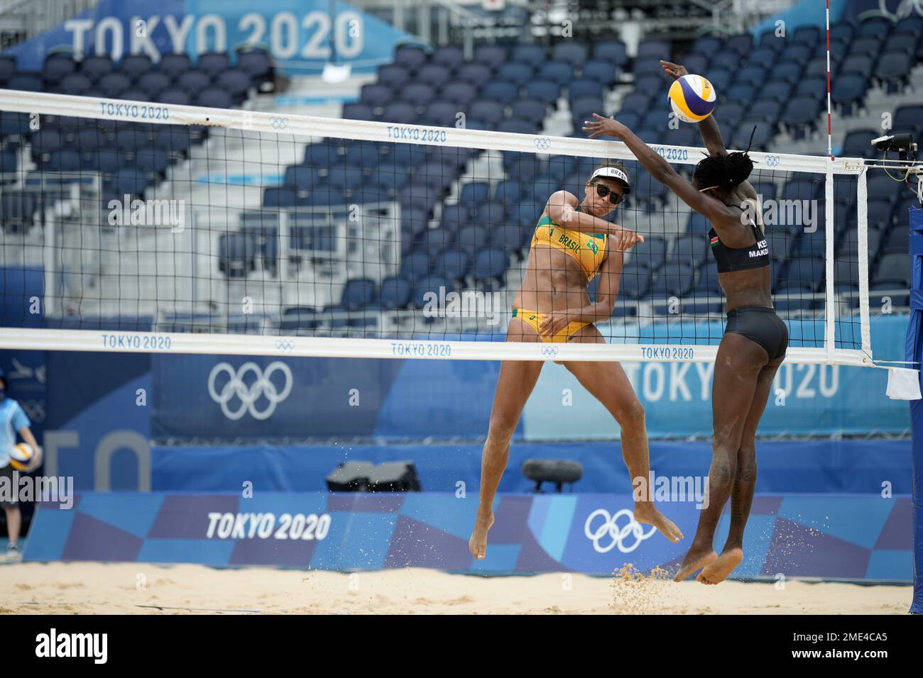 Ana Patricia Silva Ramos, left, of Brazil, gets a shot past Gaudencia ...