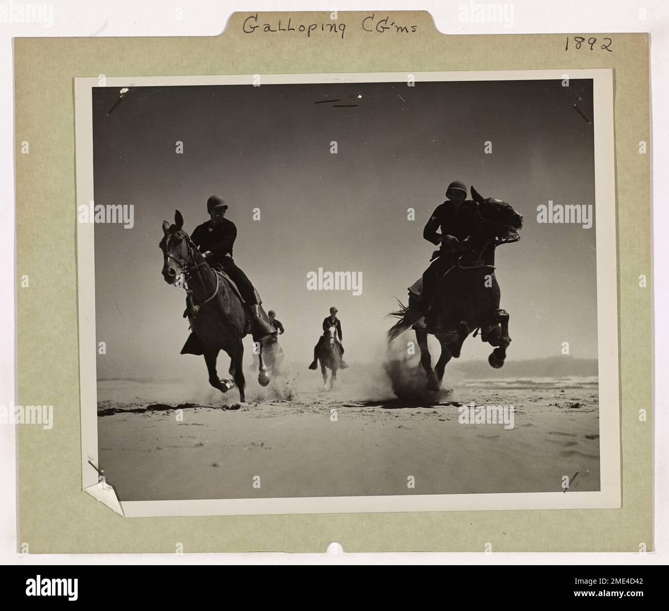 Two Coast Guardsmen are seen patrolling a remote section of the Pacific ...