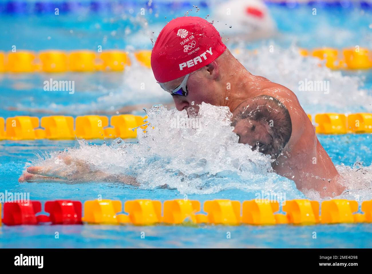 Adam Peaty, of Britain, swims in the final of the men's 100-meter ...