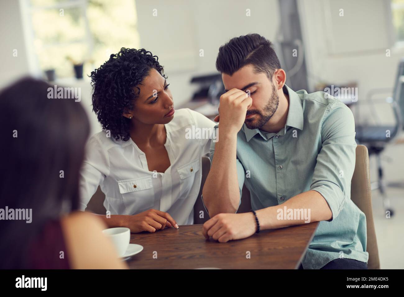 Consoling couple office hi-res stock photography and images - Alamy
