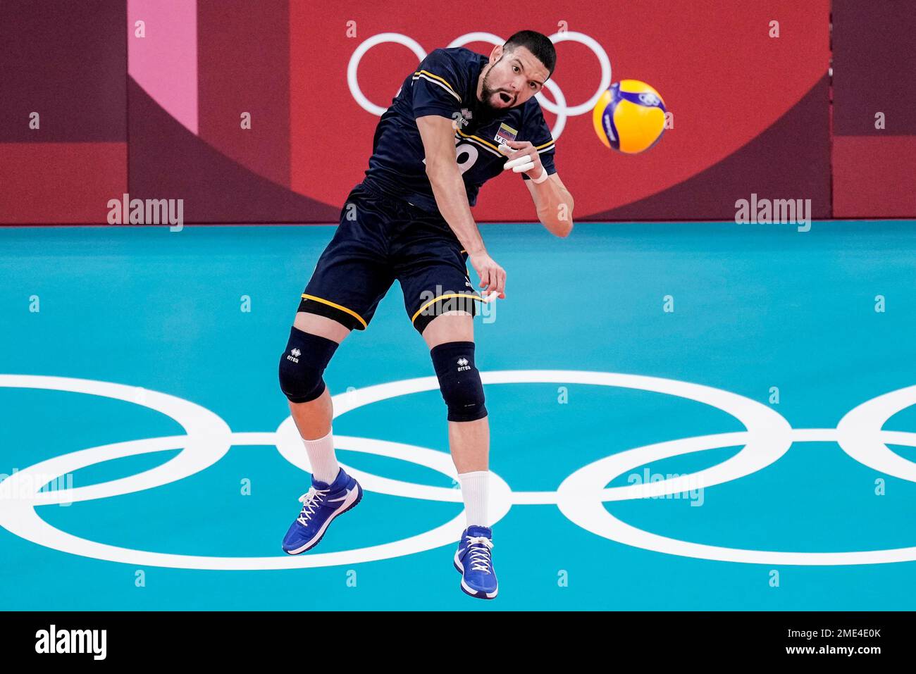 Venezuela's Willner Enrique Rivas Quijada serves a ball during the men ...