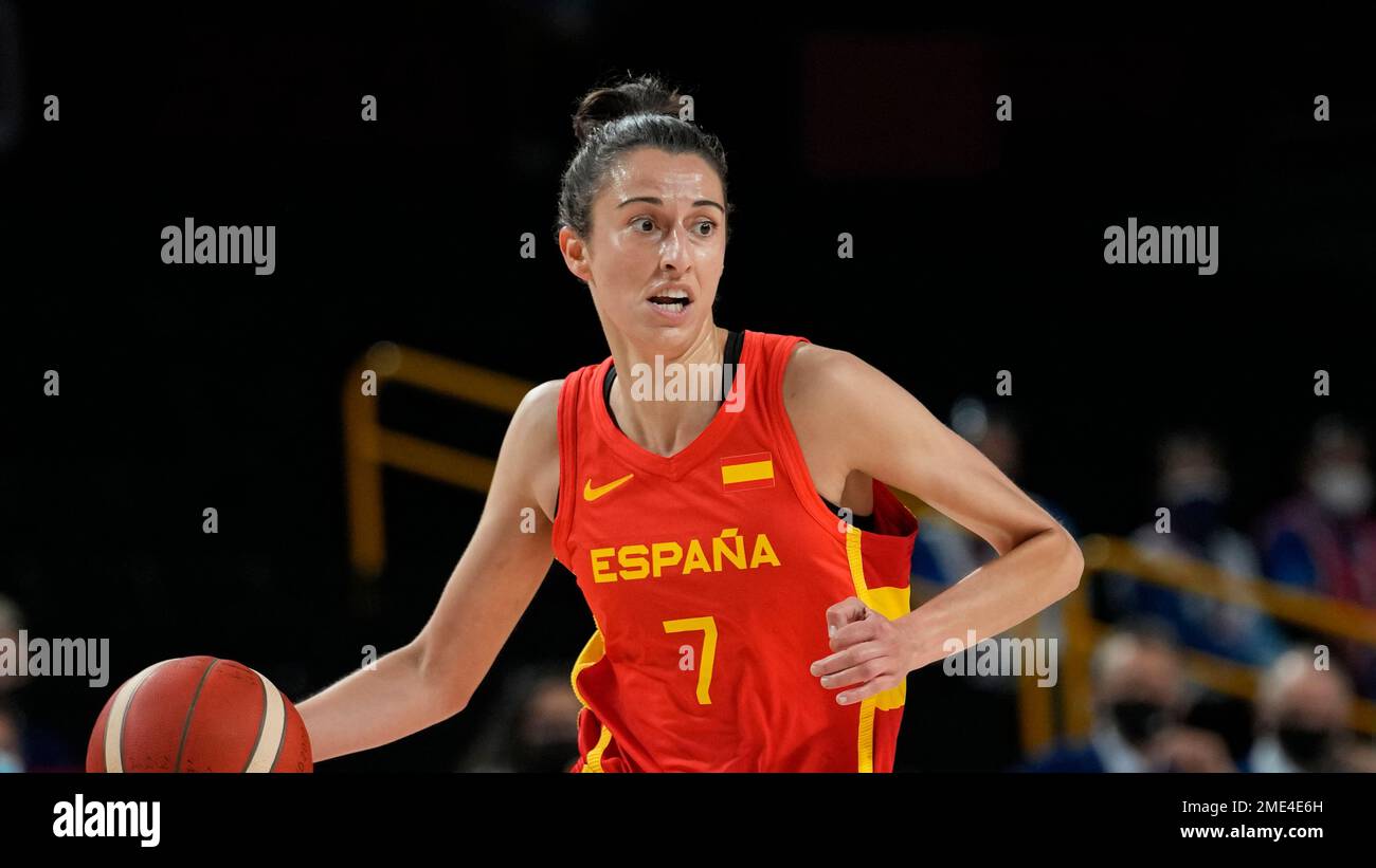 Spain's Alba Torrens (7) drives to the basket during women's basketball ...