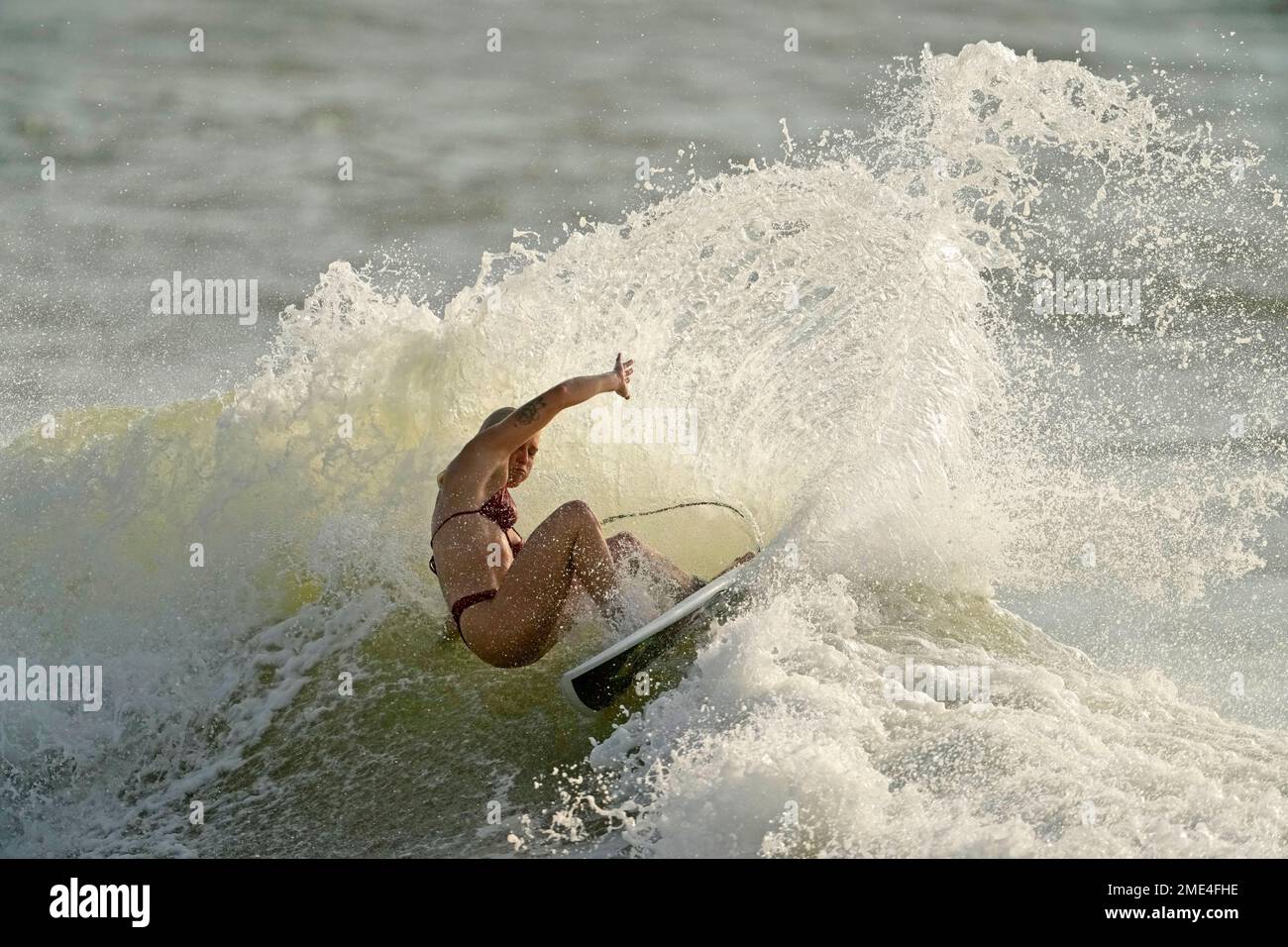 Brazil's Tatiana Weston-Webb maneuvers on a wave during warm up ahead ...