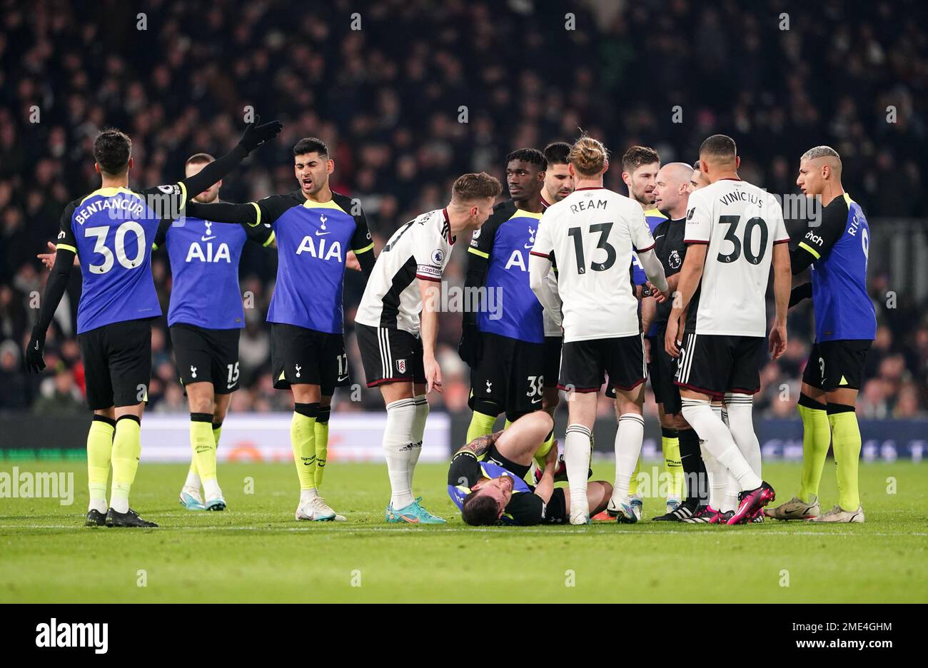 Players remonstrate with referee Paul Tierney during the Premier League ...