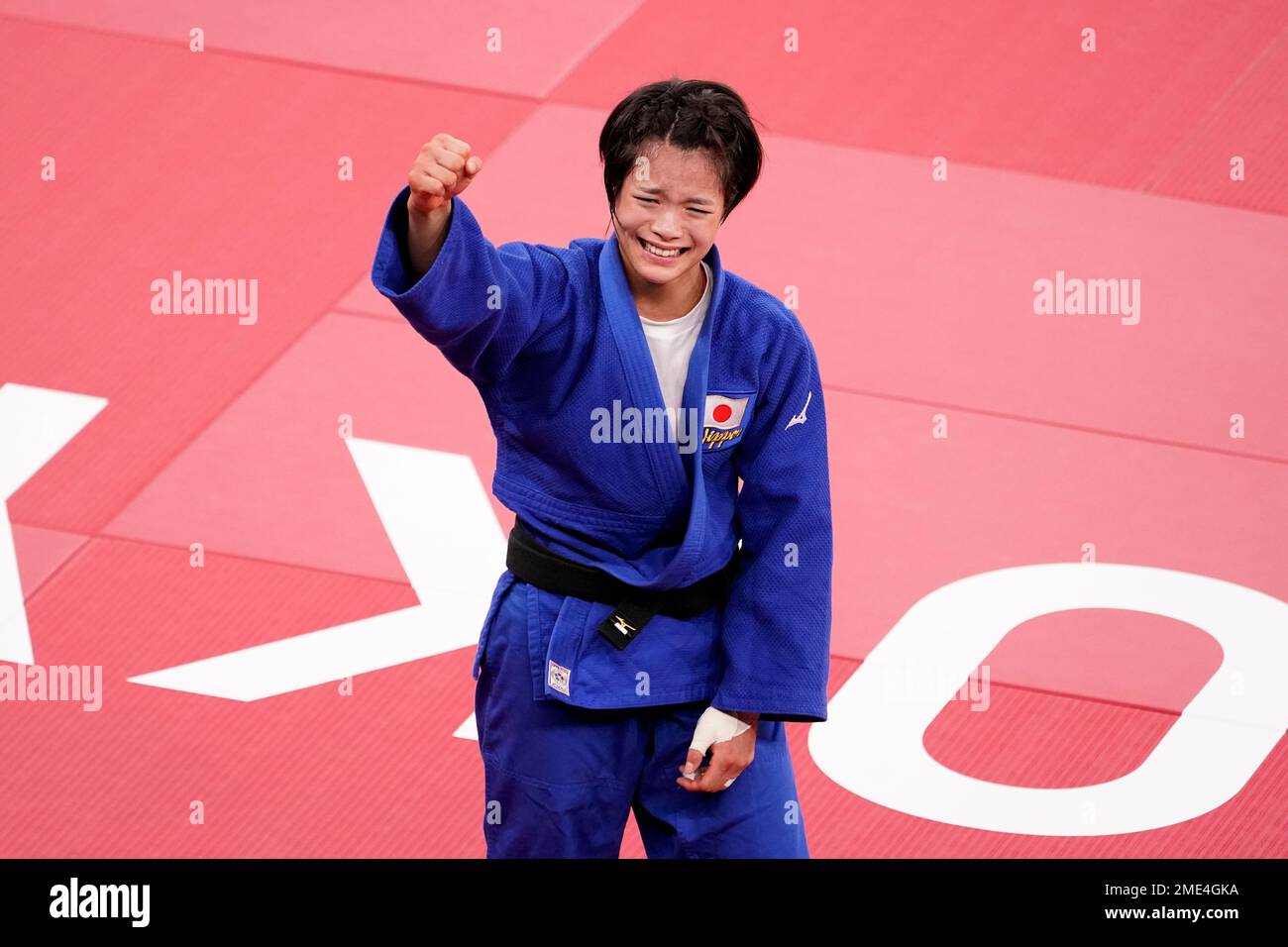 Uta Abe, of Japan, celebrates after defeating Amandine Buchard, of ...