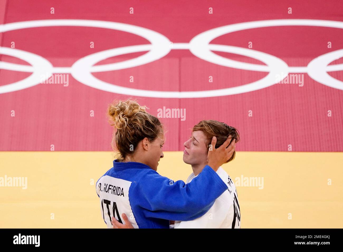 Odette Giuffrida, of Italy, left, and Reka Pupp, of Hungary, embrace ...