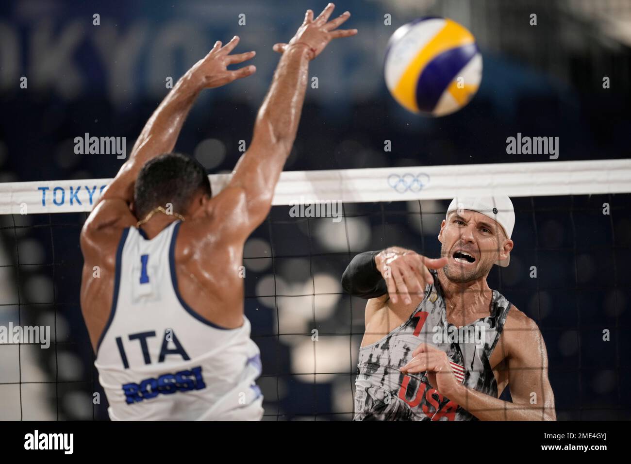 Jacob Gibb, right, of the United States, takes a shot as Enrico Rossi ...