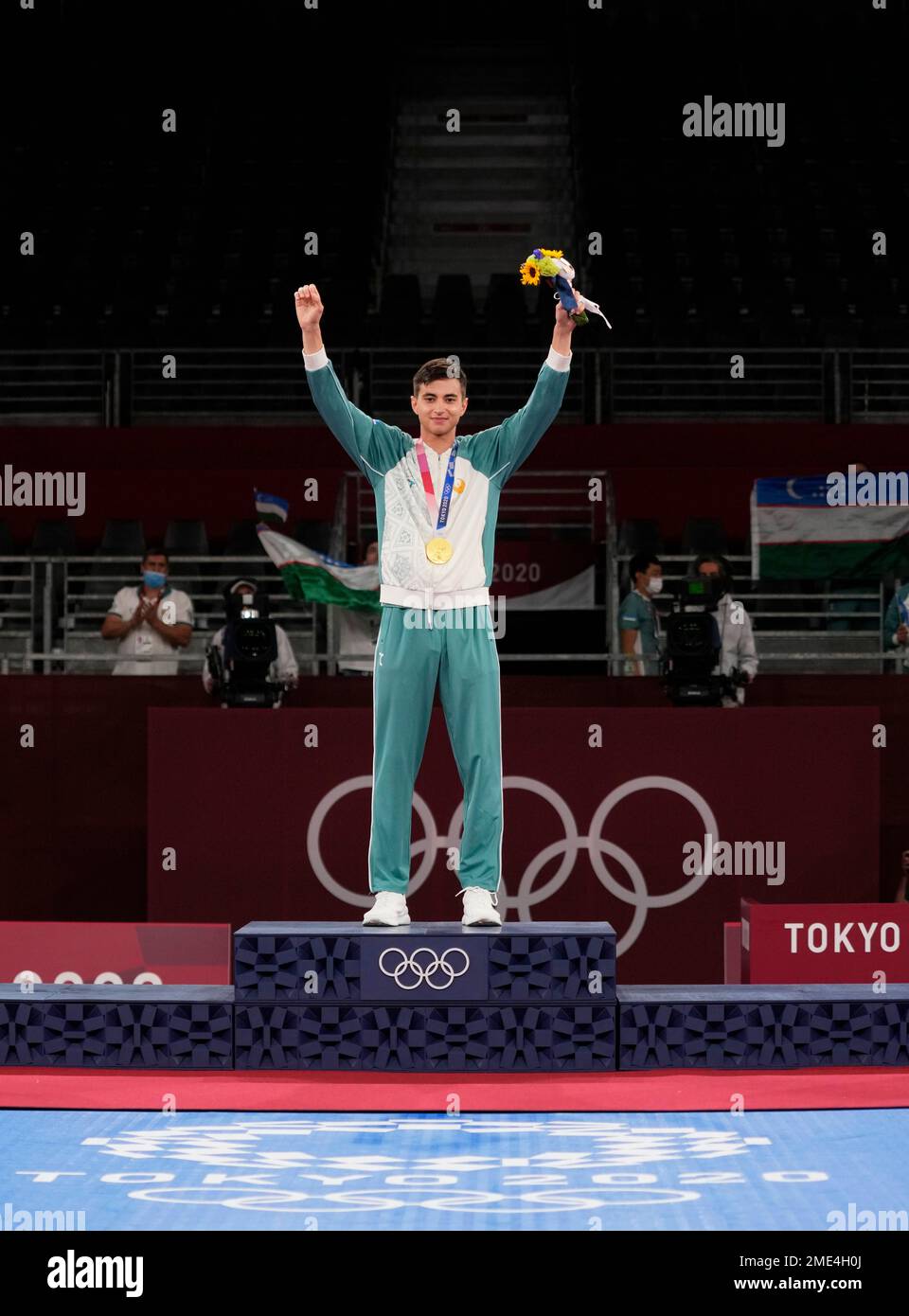 Uzbekistan's Ulugbek Rashitov celebrates after receiving his gold medal ...