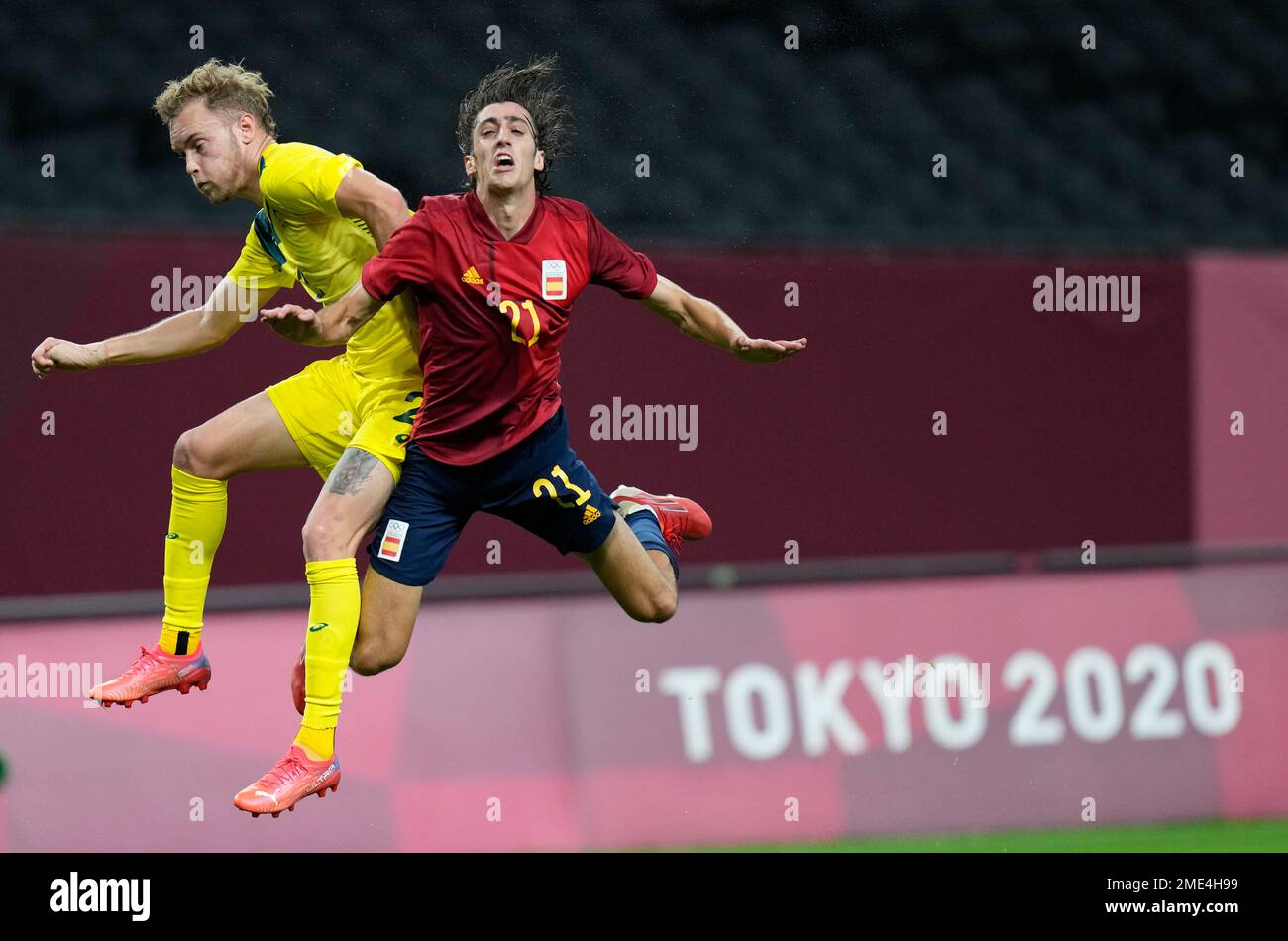 Australia's Nathaniel Atkinson, left, and Spain's Bryan Gil fight the ...