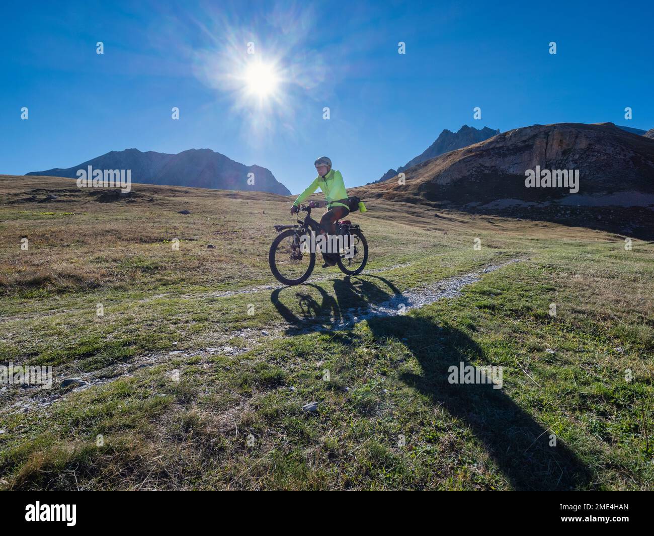 Senior man riding mountain bike sunny day vanoise national park hi-res ...