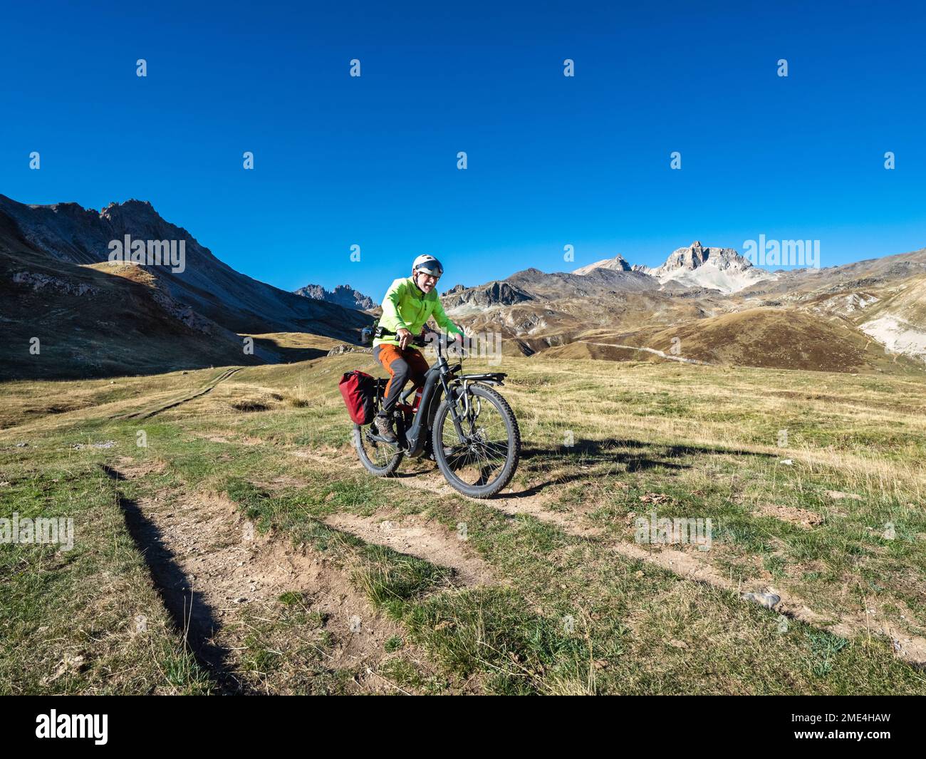 Senior man riding mountain bike pathway hi-res stock photography and ...