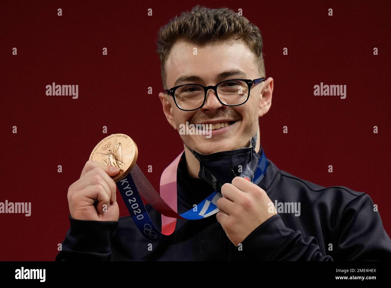 Mirko Zanni of Italy stands on the podium after winning the bronze ...