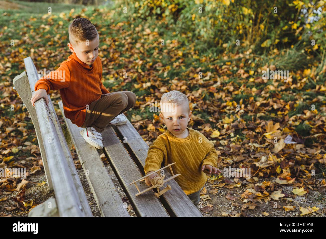 Two brother playing on bench hi-res stock photography and images - Alamy