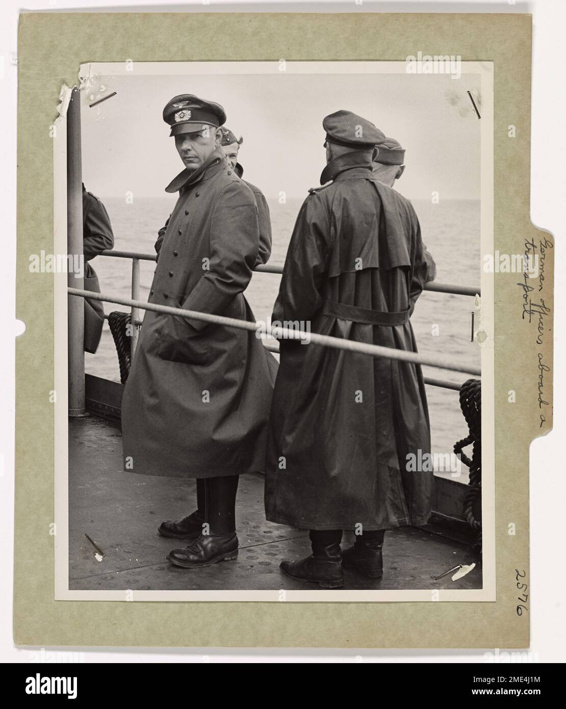 Captured German officers are seen aboard a Coast Guard-manned transport ...