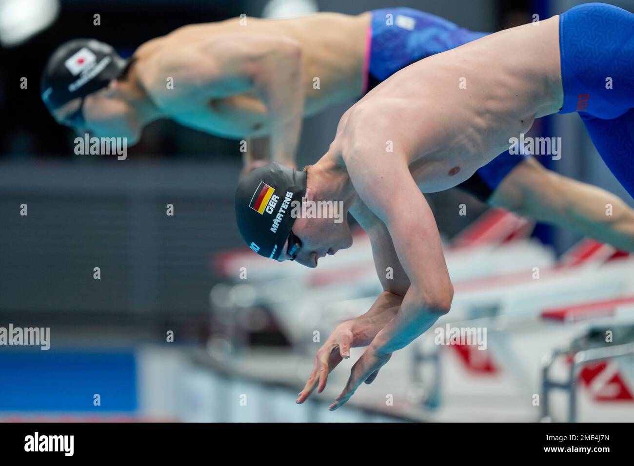Lukas Martens, of Germany, starts in a swim off against Katsuhiro ...