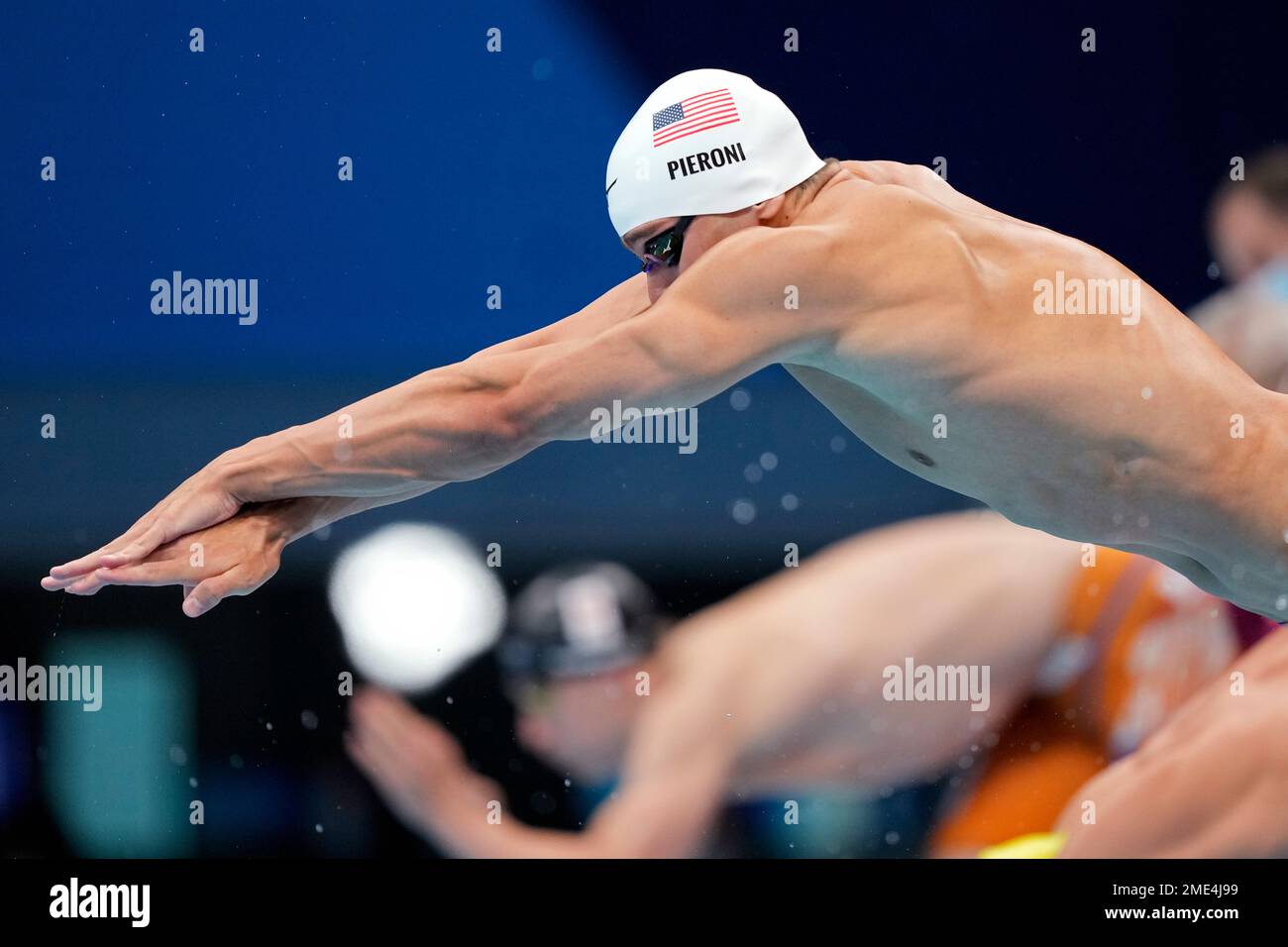 United States' Blake Pieroni dives in to swim his leg of the men's ...