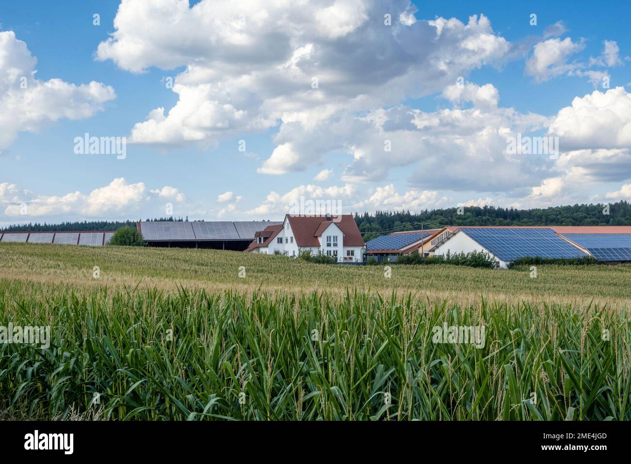 Germany, Bavaria, Augsburg, Clouds floating over countryside field with ...