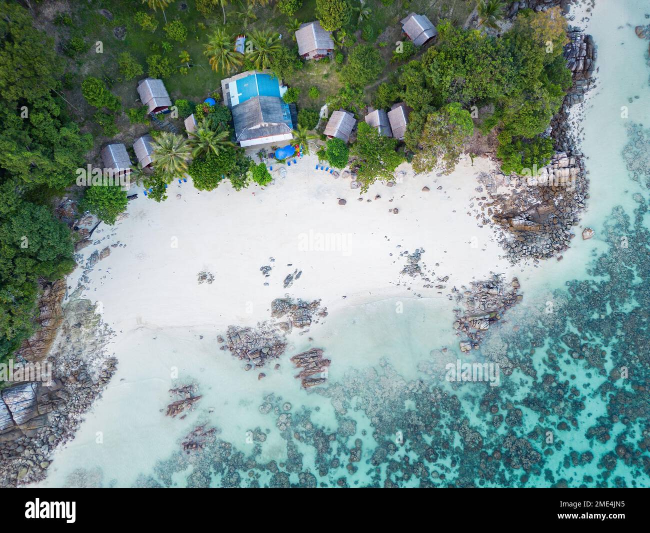 An top view of Sanom Beach with green trees on Ko Lipe island in ...