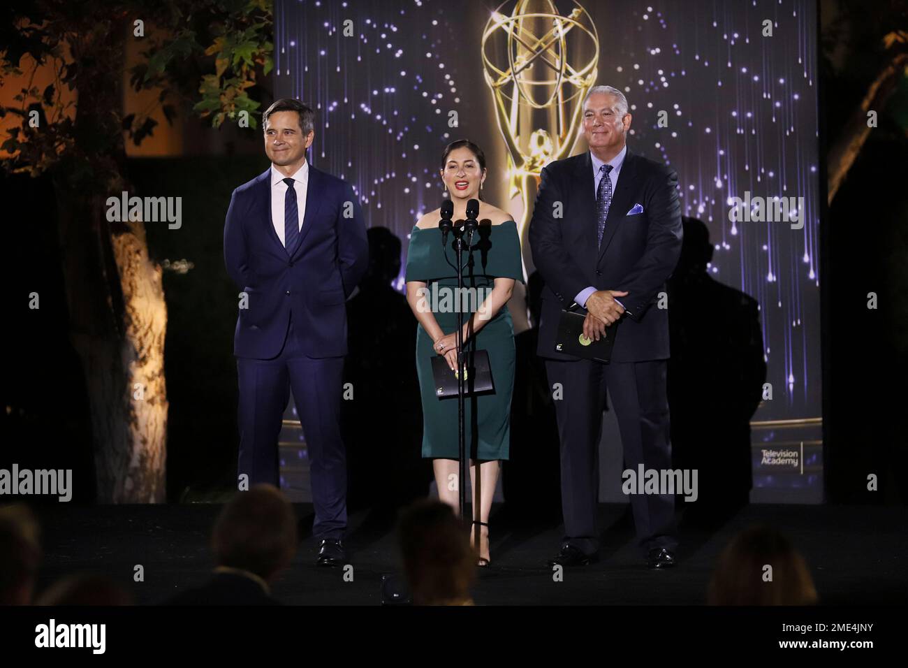 Ernst & Young executives Andy Sale, Edith Varela, and Paul Chen are the ...