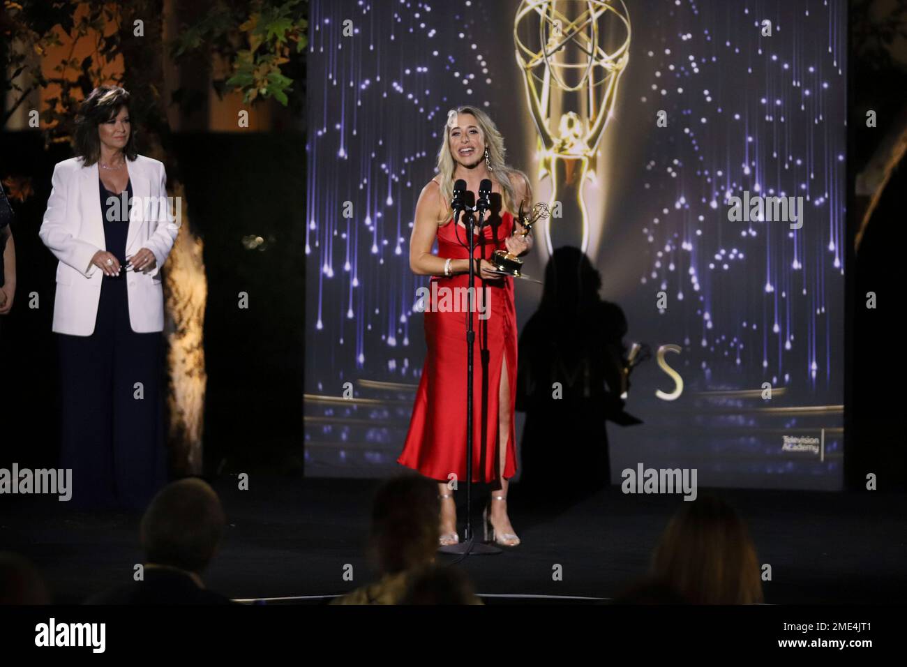 Sarah Pilla accepts the Environment News Story Emmy for Spectrum News 1 ...